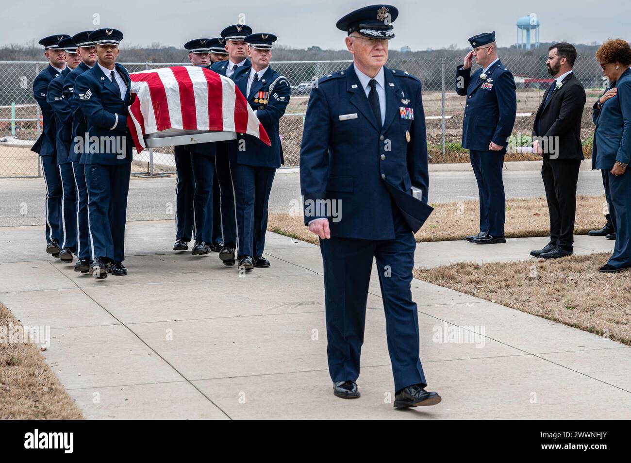 Soldiers with the Fort Sam Houston Caisson Section carry the flag ...