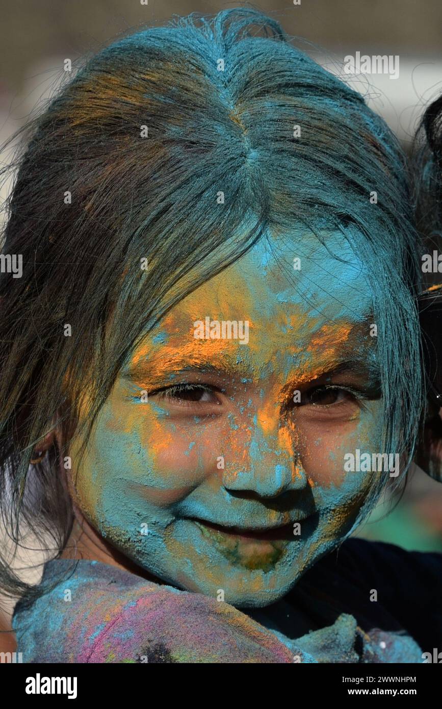 Indian and Nepalian people celebrating Festival of colors Holi at ...