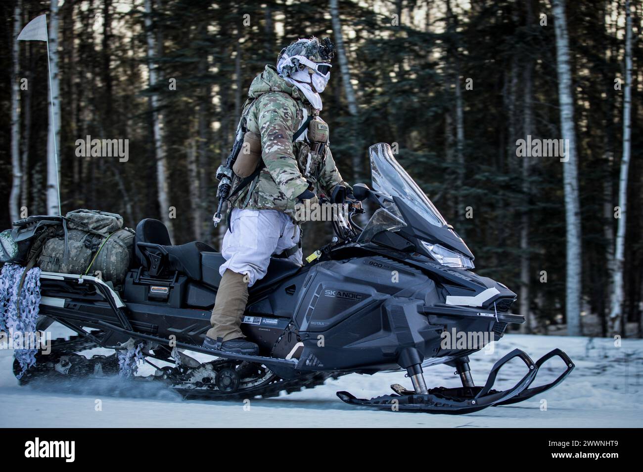 U.S. Army Soldiers assigned to the 11th Airborne Division patrol on ...