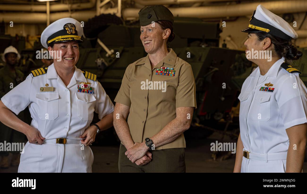 U.S. Navy Capt. Michel Brandt, left, commanding officer of the ...