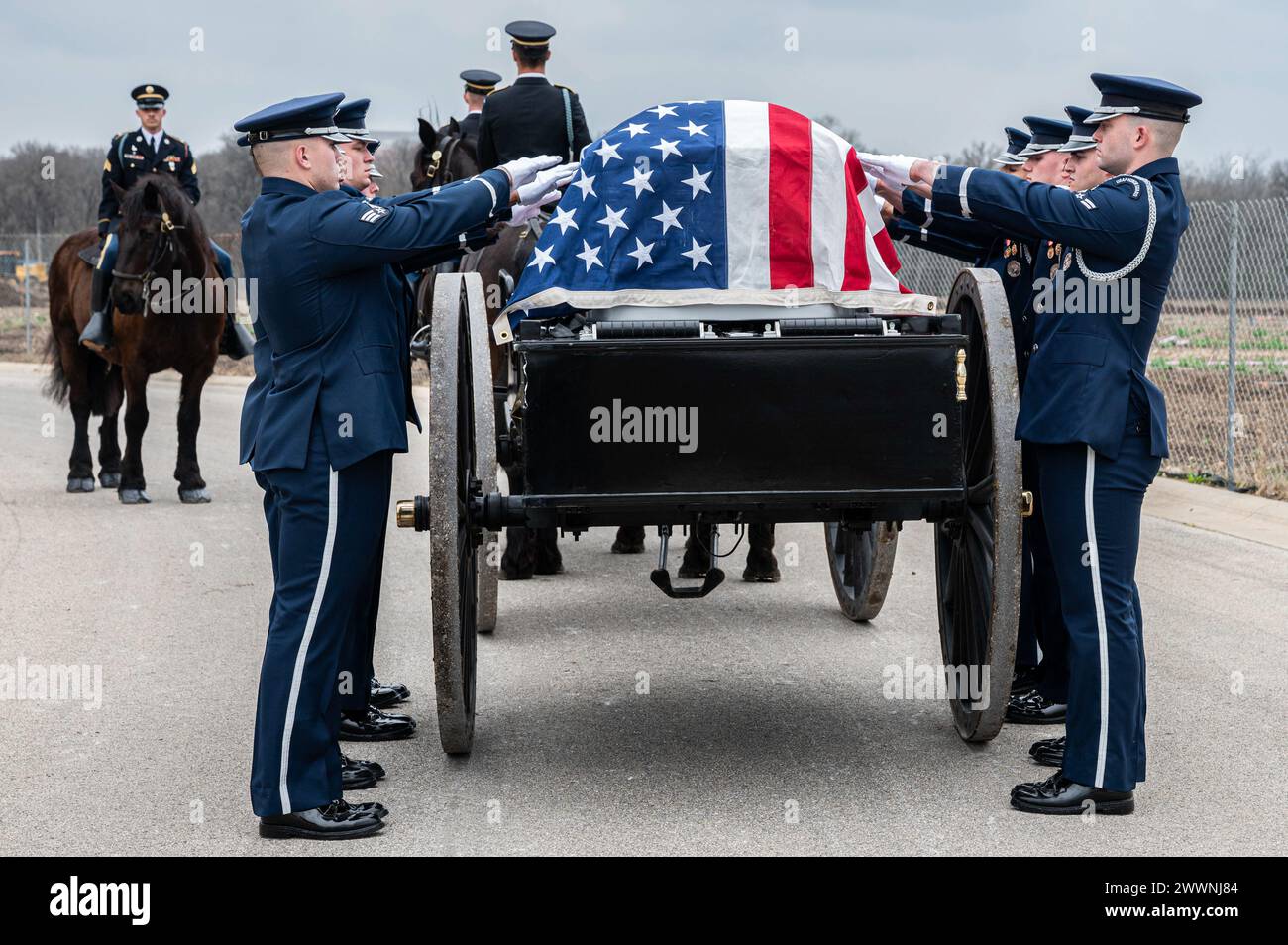 Soldiers with the Fort Sam Houston Caisson Section carry the flag ...