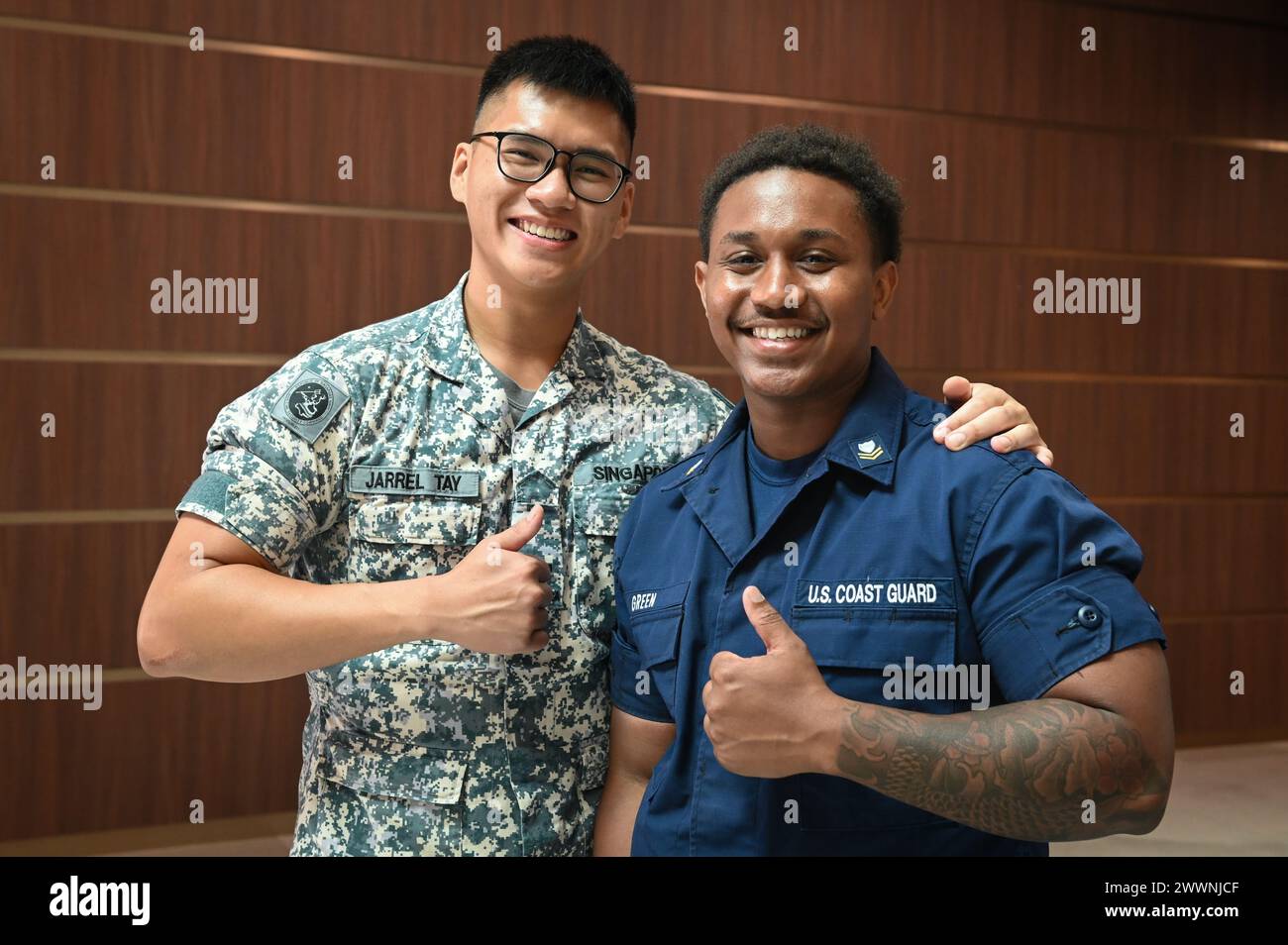 Petty Officer 2nd Class Dallas Green, a crewmember from U.S. Coast ...
