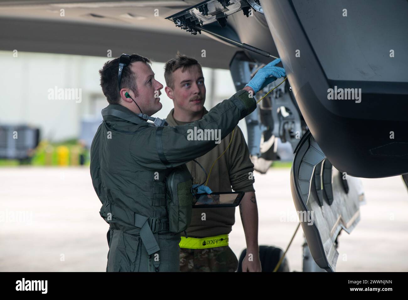 U.S. Air Force Capt. Clark Niles, left, 4th Fighter Squadron pilot, and ...