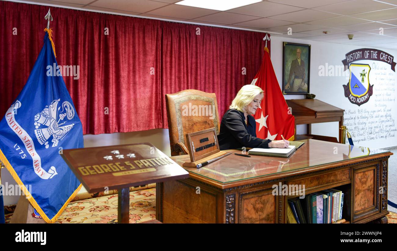 The Honorable Christine Wormuth, U.S. Secretary of the Army, signs a ...