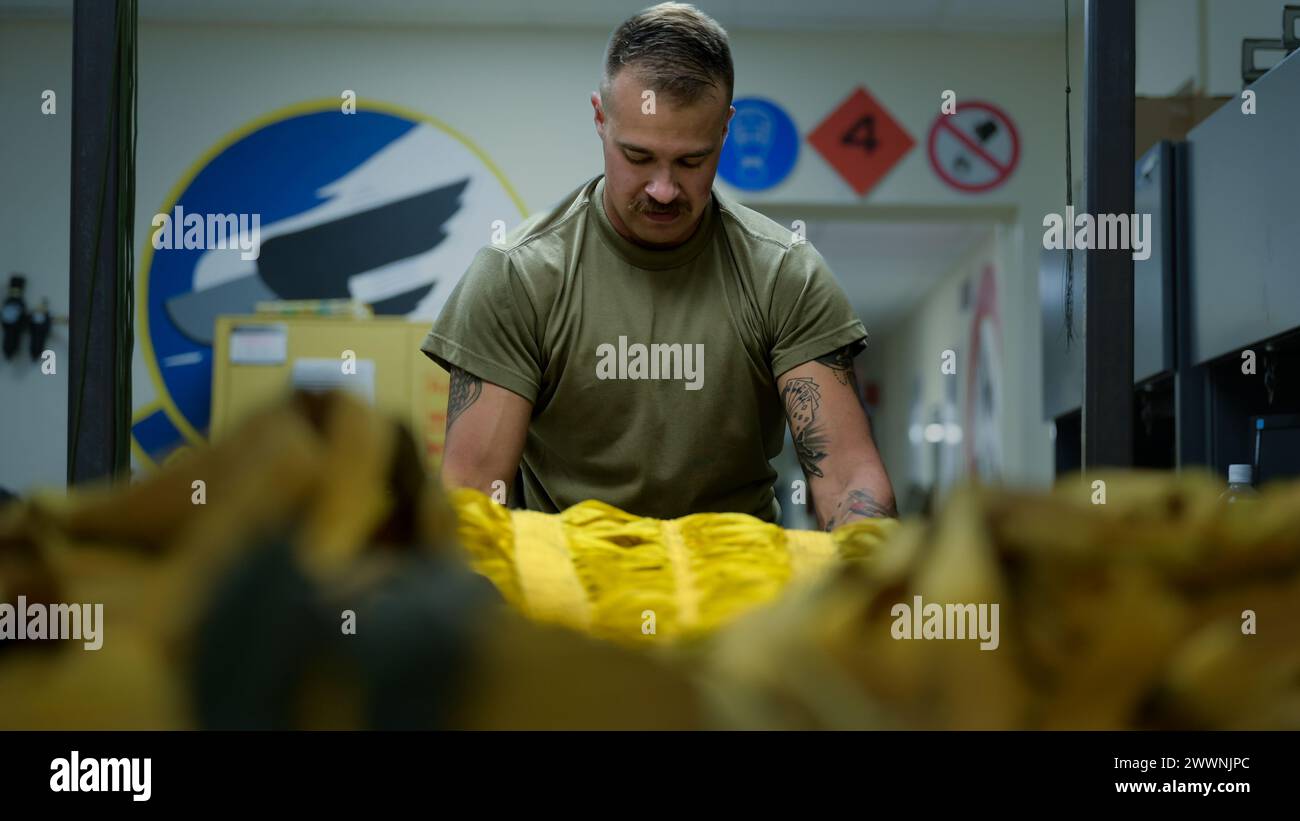 U.S. Air Force Airman 1st Class Marcus Kelley, aircrew flight equipment ...