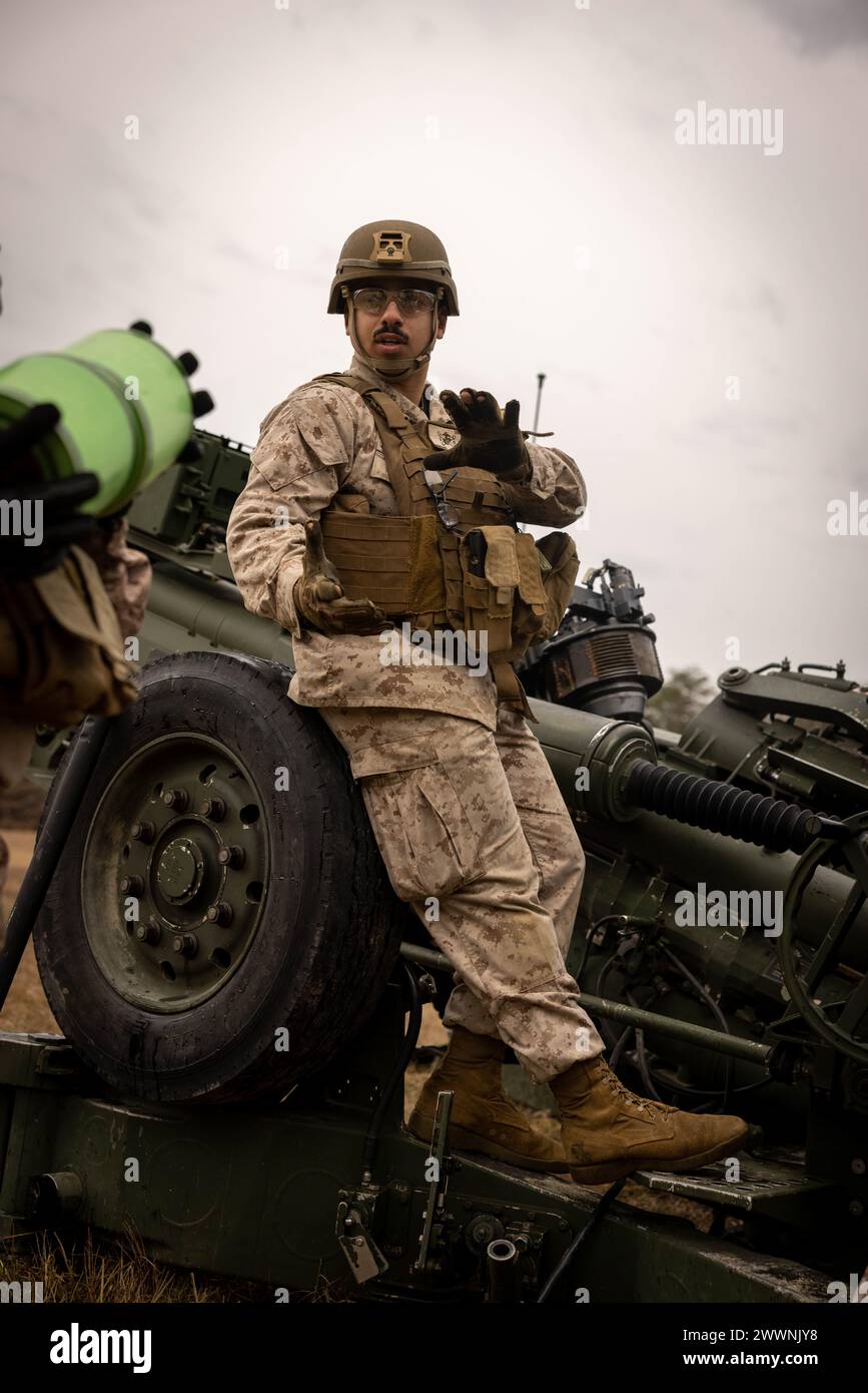 U.S. Marines with The Basic School demonstrate how to operate an M777 ...