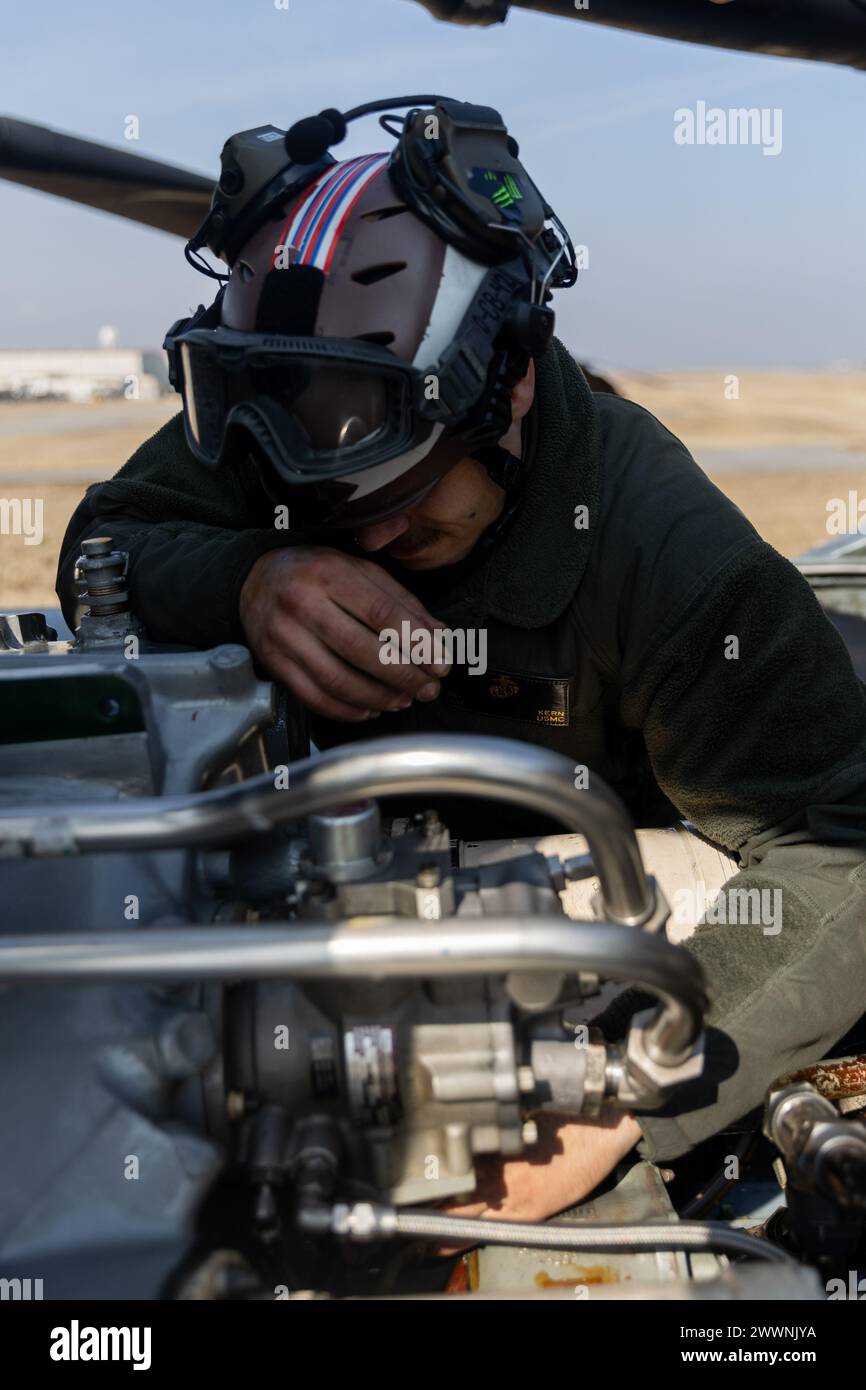 U.S. Marine Corps Sgt. Hunter Kern, a CH-53E Super Stallion helicopter ...