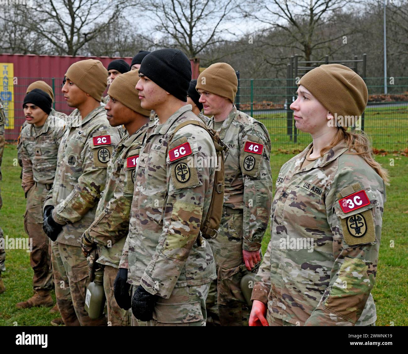 U.S. Army Medics from Medical Readiness Command, Europe, listen the ...