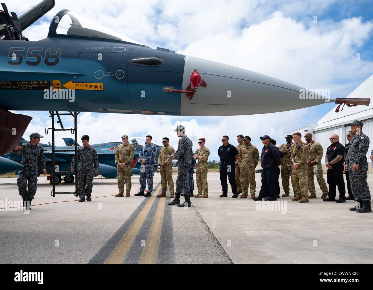 Members of the Japan Air Self-Defense Force talk about emergency rescue ...