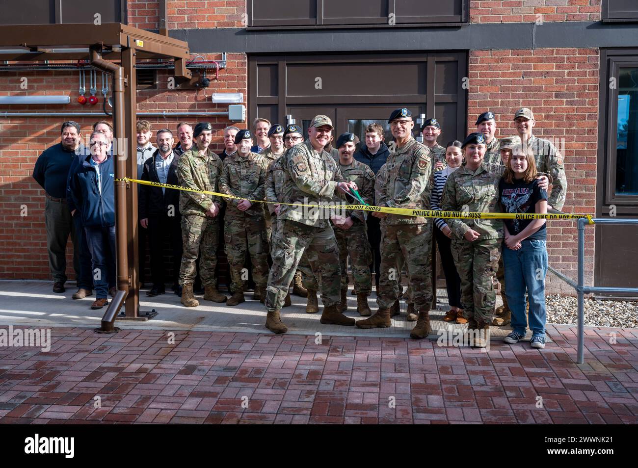 Liberty Wing members participate in a ribbon cutting ceremony for new ...