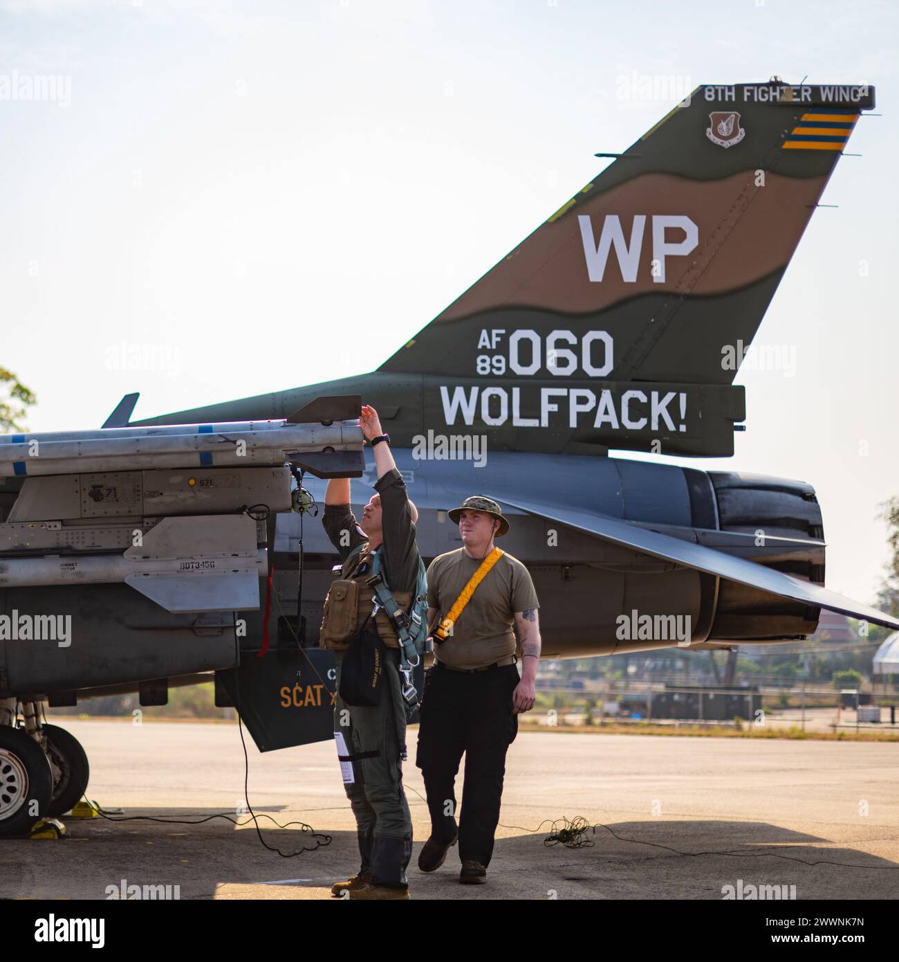 Col. Matthew C. Gaetke, left, 8th Fighter Wing commander, conducts a ...