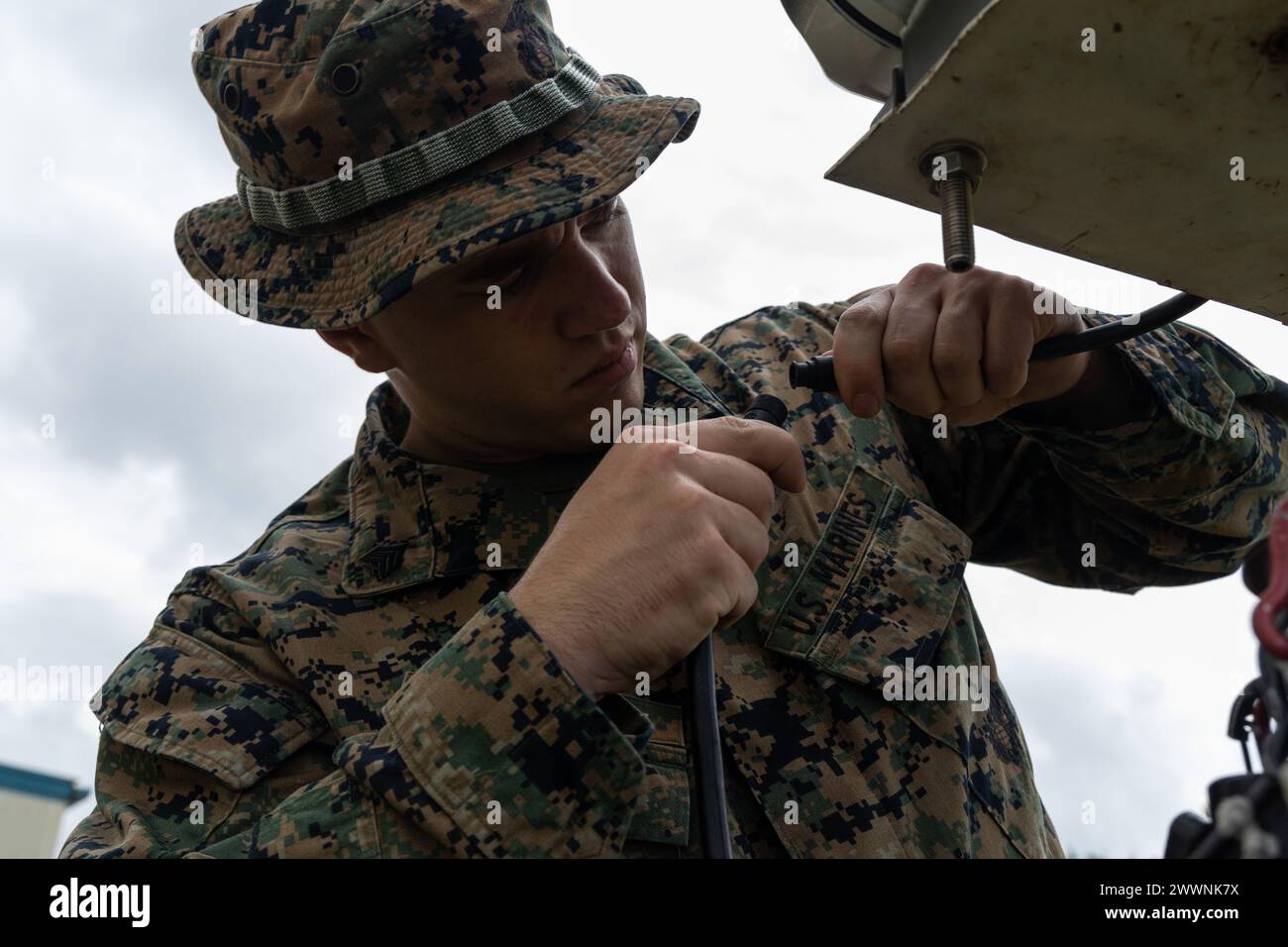 U.S. Marine Corps Sgt. Guy Tobin, a transmissions system operator with ...