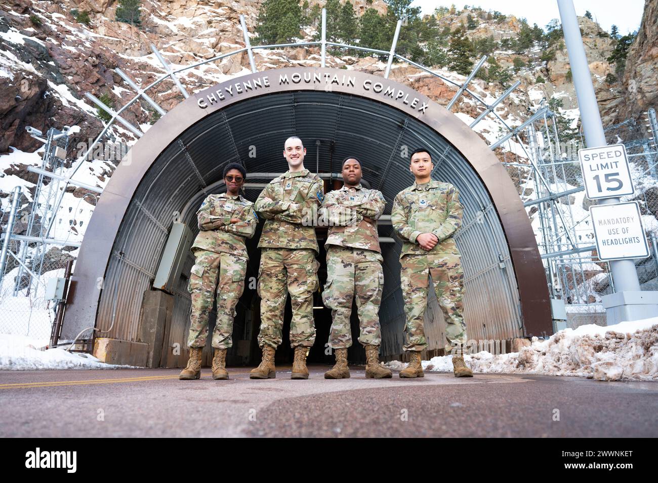 Four service members pose for a photo on Cheyenne Mountain Space Force ...