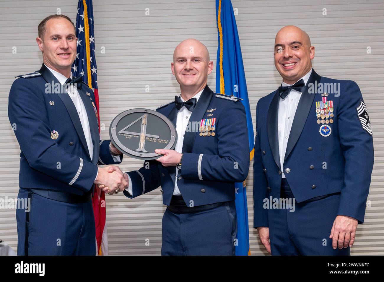 Lt. Col. Taylor Gifford, center, 336th Fighter Squadron commander ...