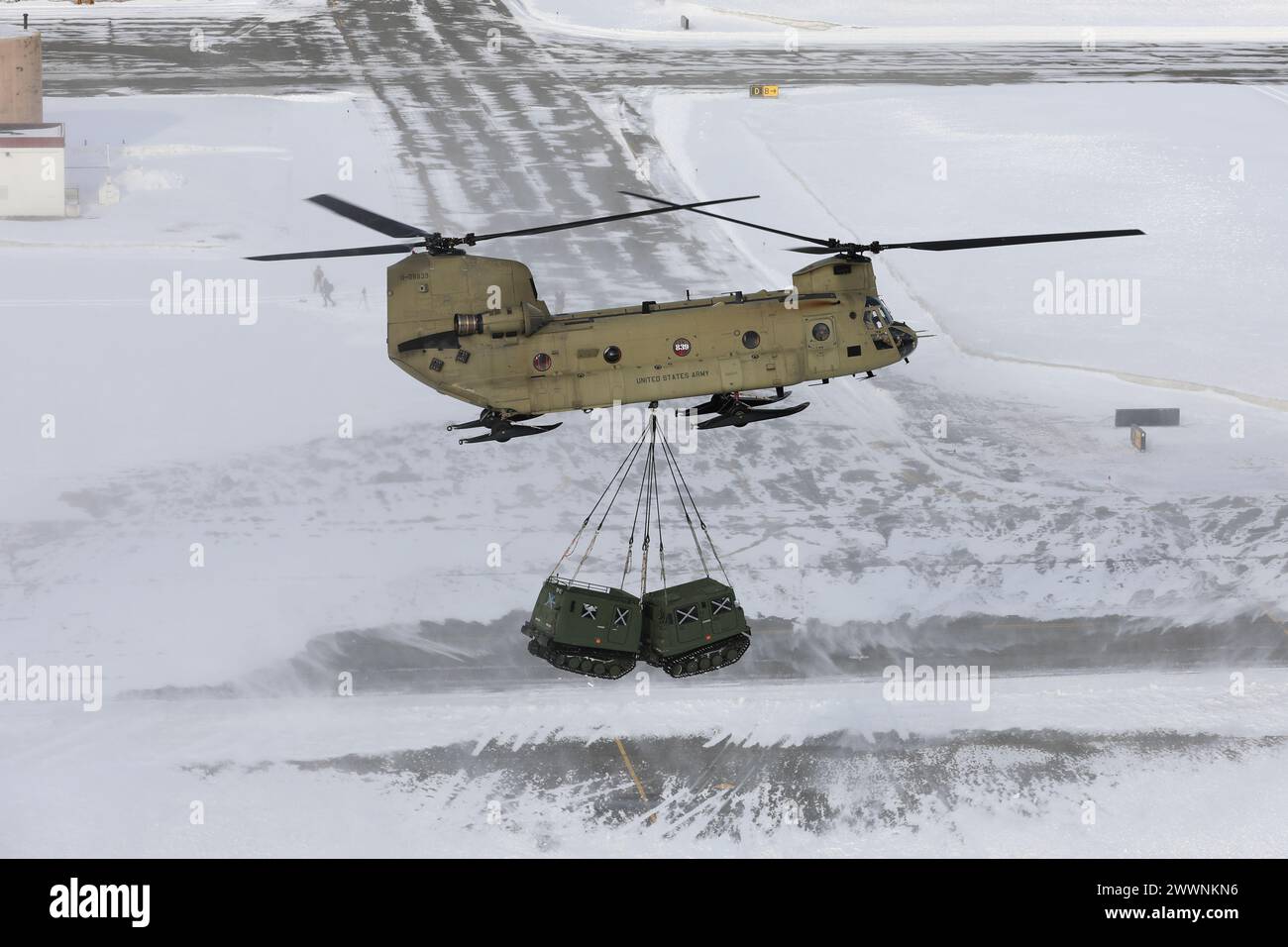 An Alaska Army National Guard CH-47F Chinook helicopter lifts a Small ...