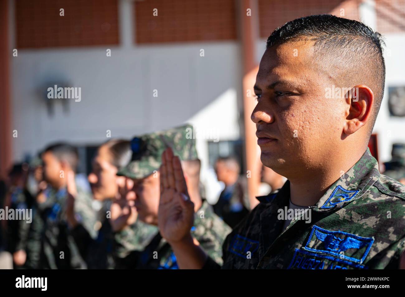 A member of the Honduran Air Force repeats the noncommissioned officer ...