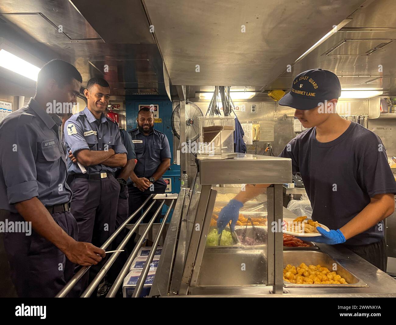 U.S. Coast Guard Petty Officer Third Class Alejandro Mercado Sanchez, a ...