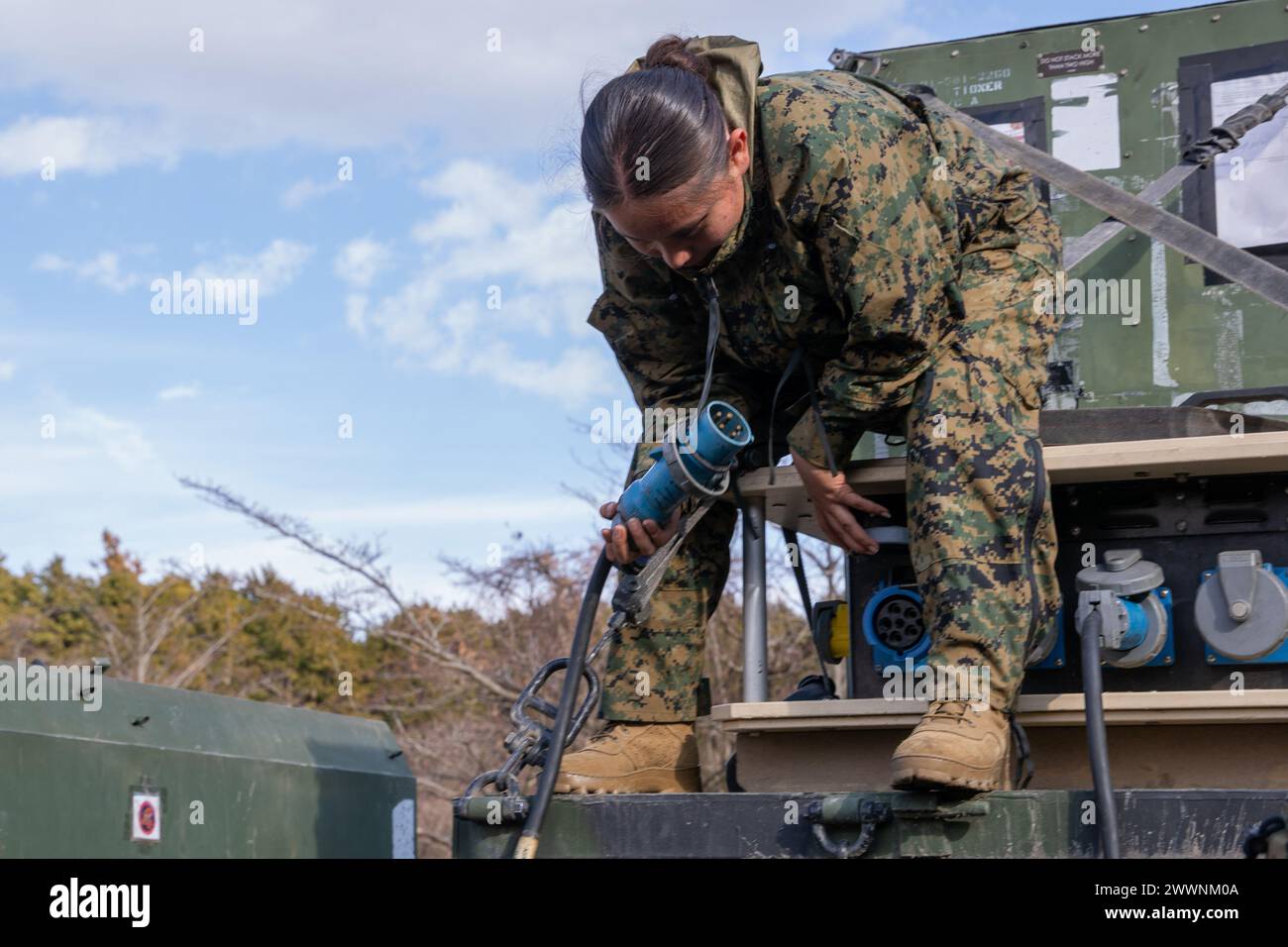 U.S. Marine Corps Lance Cpl. Eugenia Garza, an electrician with Combat ...