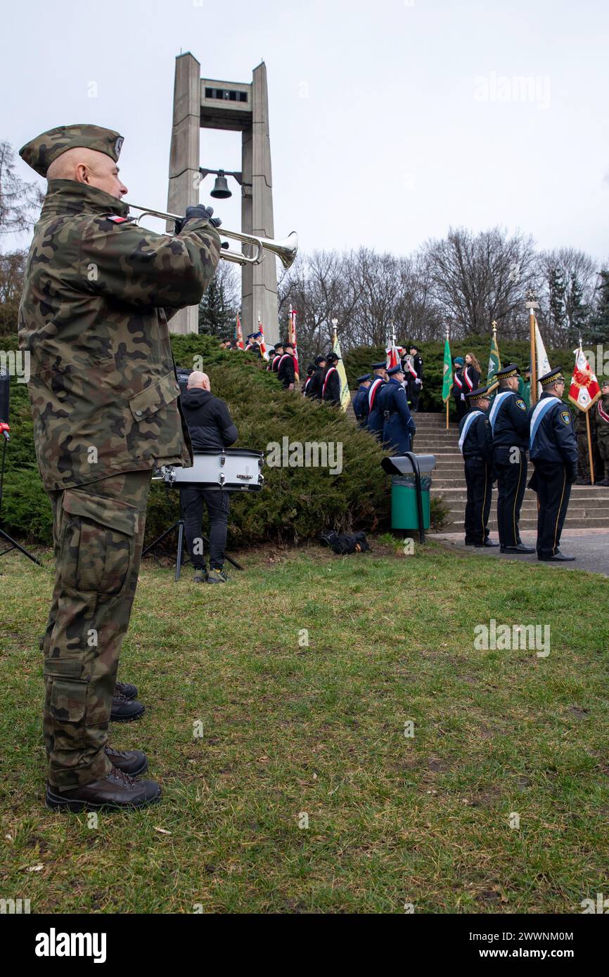 The Polish Armed Forces Band plays instruments during a ceremony at ...