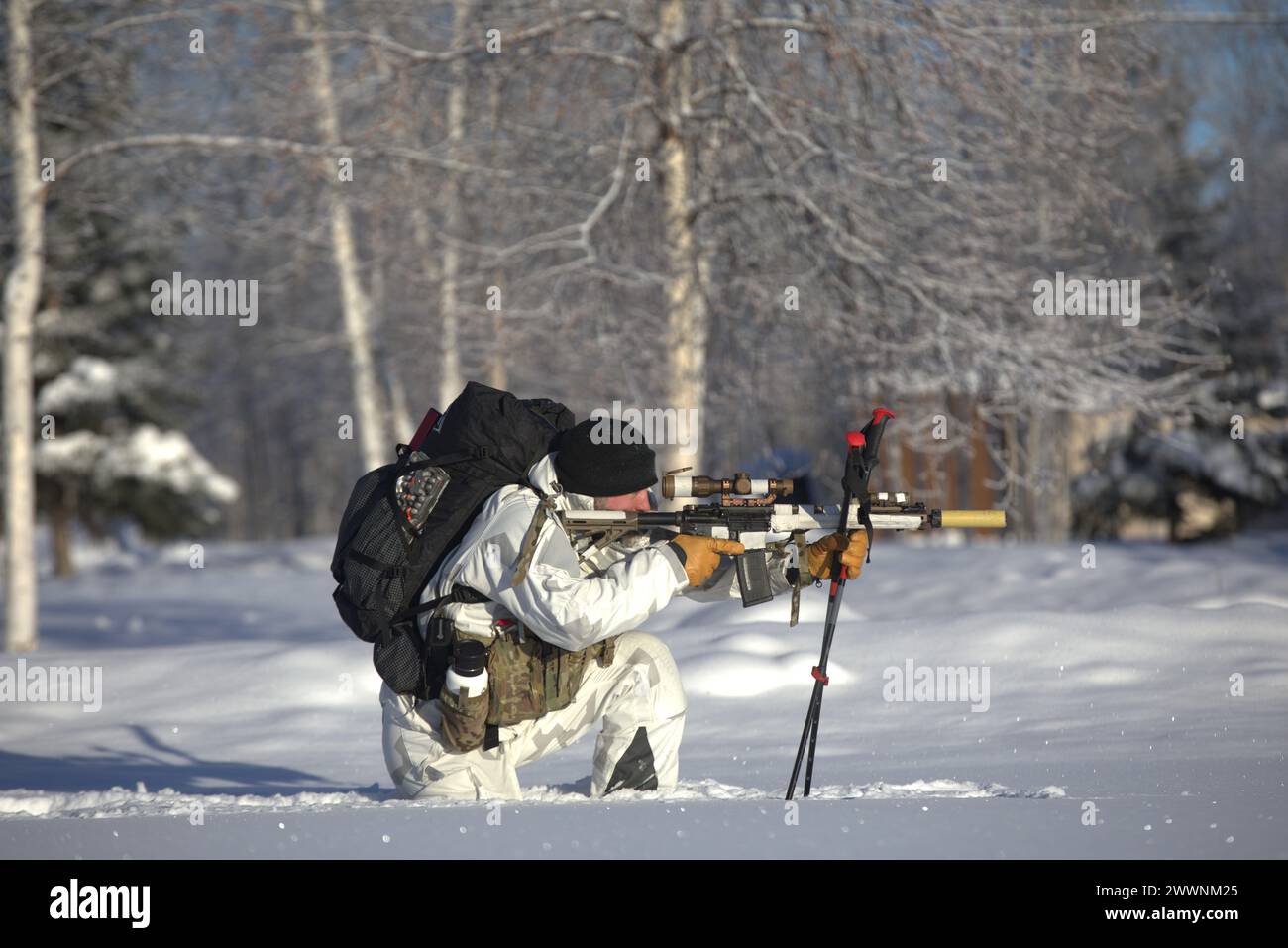 U.S. Army 10th Special Forces Group (Airborne) Green Beret fires a ...