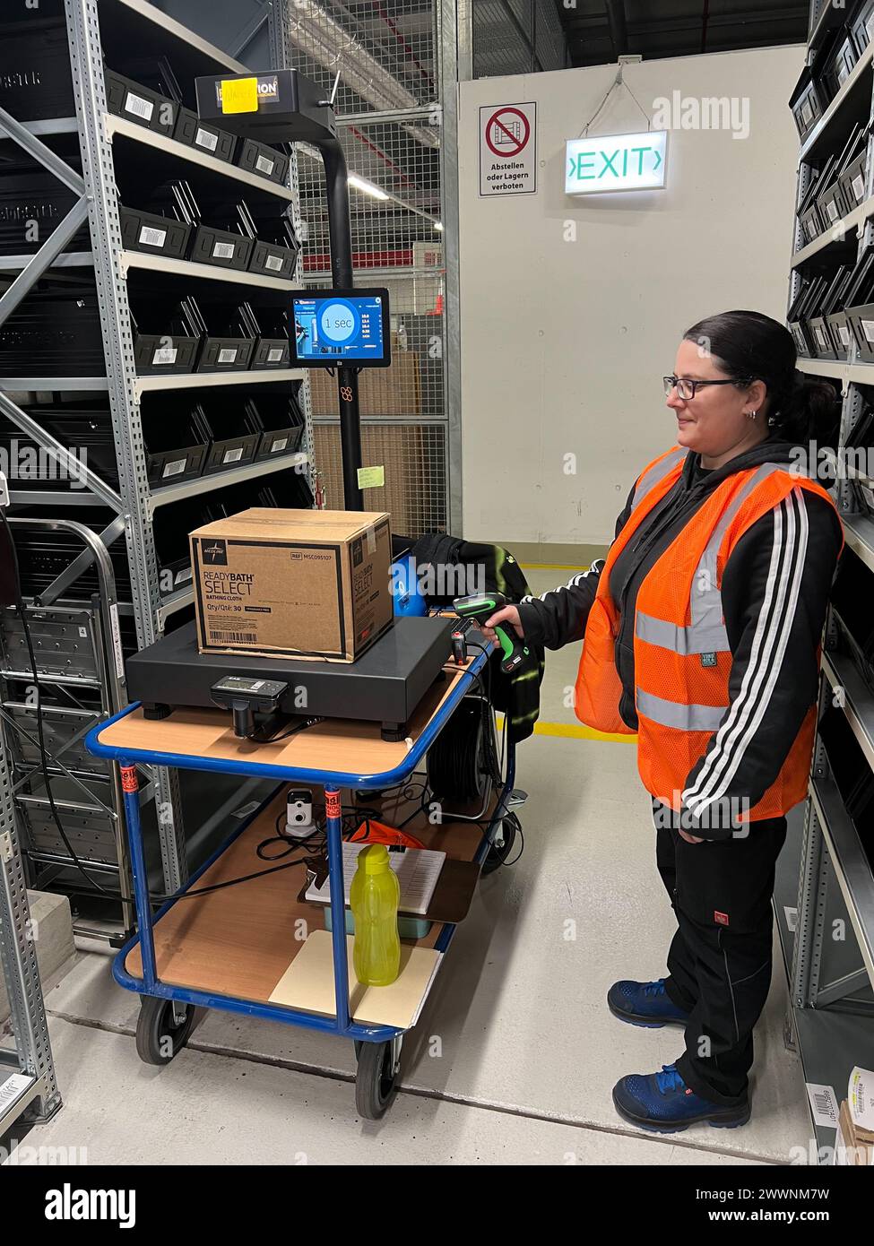 Jeanette Hoeh, a supply technician at the U.S. Army Medical Materiel Center-Europe, scans a box ...