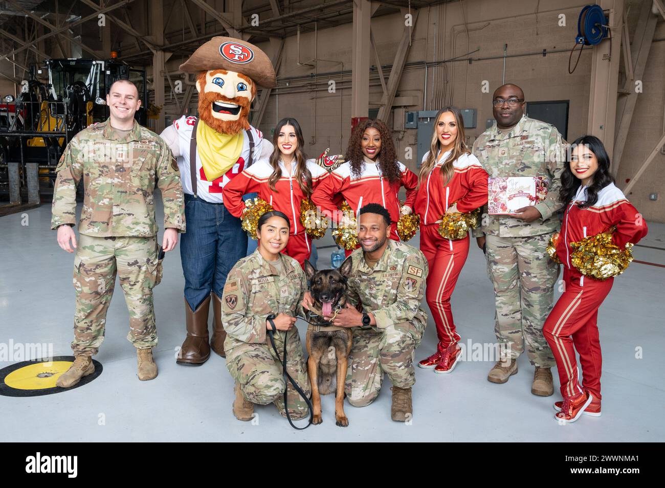 Kansas City Chiefs cheerleaders, mascot Sourdough Sam and Airmen pose ...