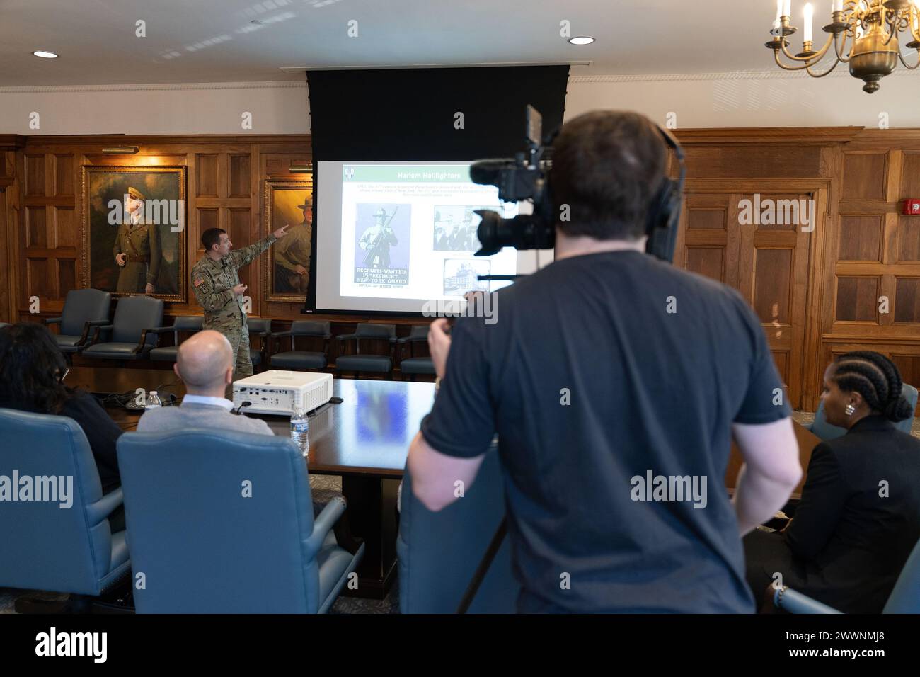 Officers with the 369th Sustainment Brigade meet with members of ...