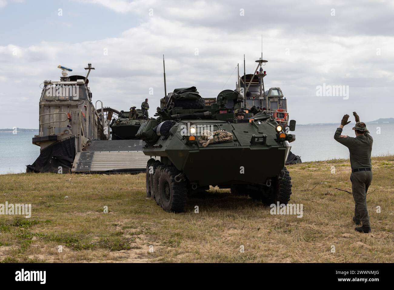 A U.S. Navy Sailor with the amphibious dock landing ship USS Green Bay ...
