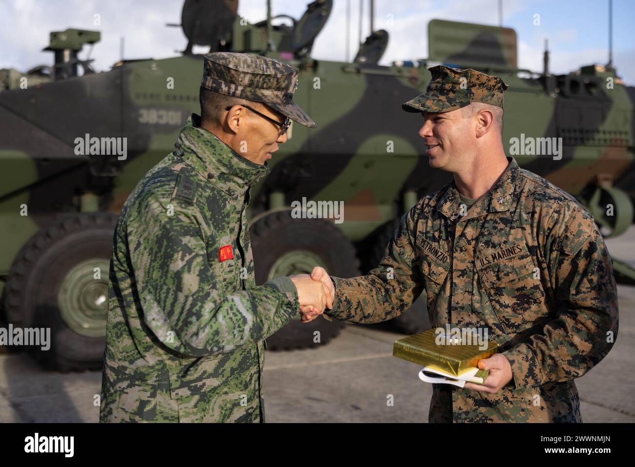 U.S. Marine Corps Lt. Col. Daniel R. Petronzio, right, commanding ...