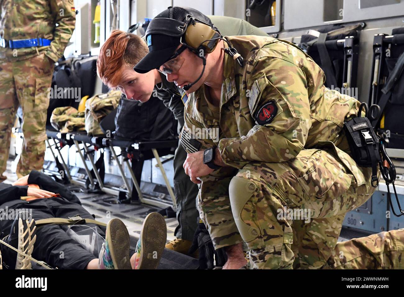 U.S. Air National Guard Master Sgt. Maddy Hefner, a loadmaster assigned ...
