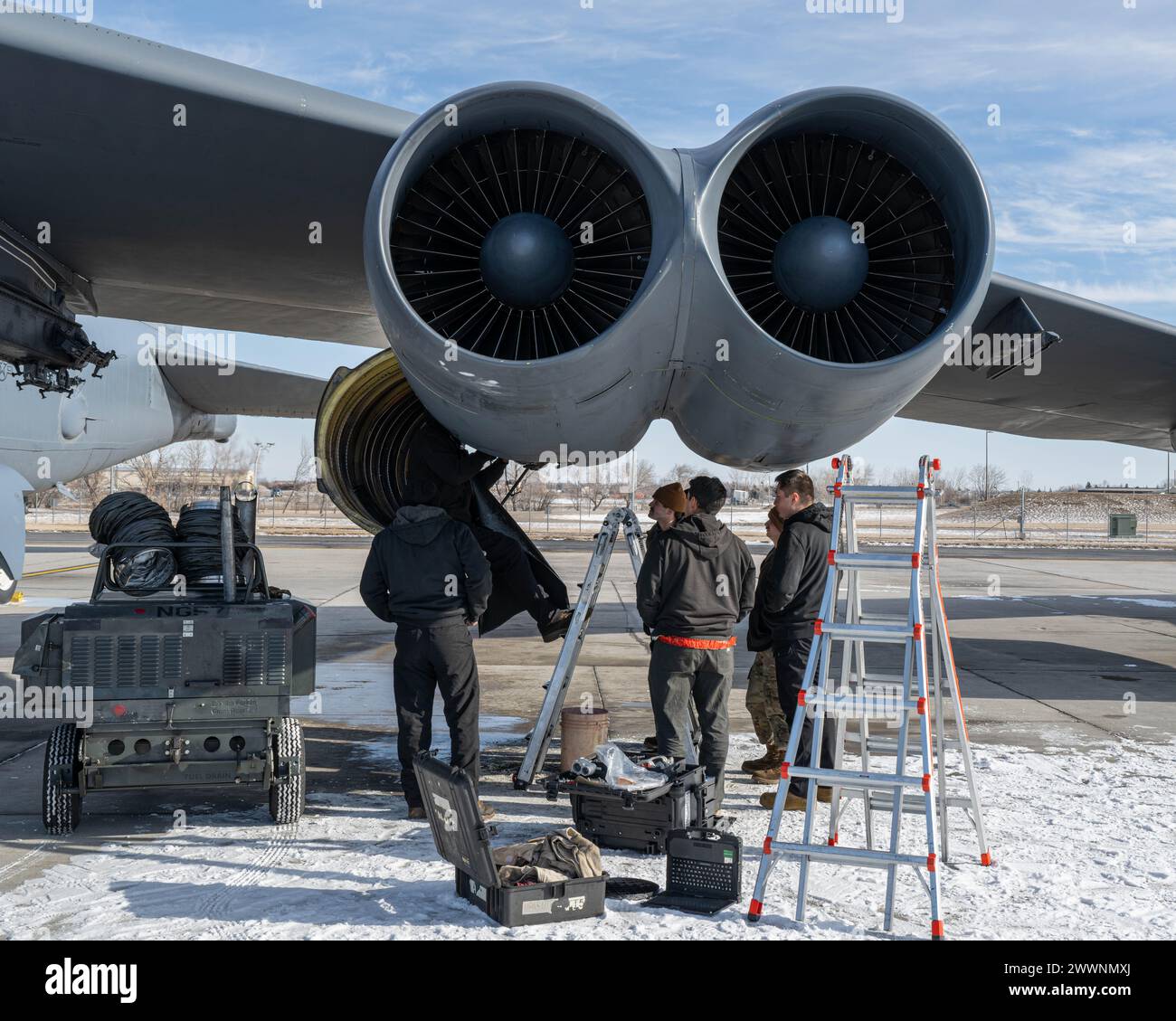 Airmen assigned to the 5th Aircraft Maintenance Squadron perform maintenance on a B-52H ...