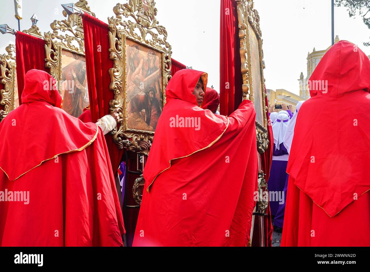 Antigua, Guatemala. 24th Mar, 2024. Penitents prepare to lead a massive ...