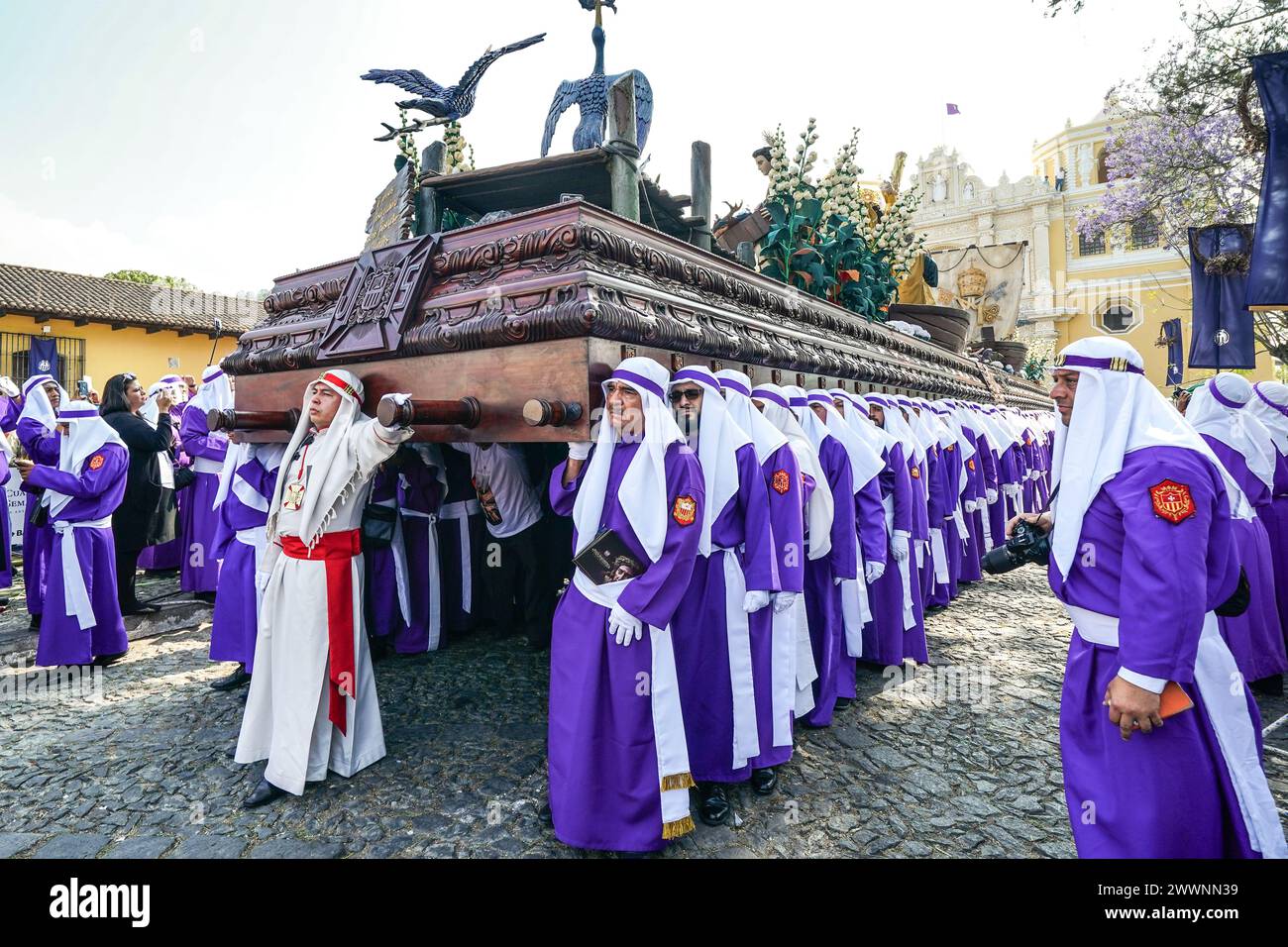 Antigua, Guatemala. 24th Mar, 2024. Catholic penitents carry the ...