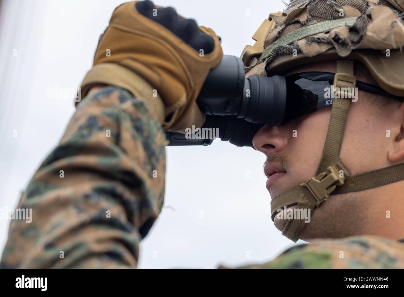 U.S. Marine Corps Lance Cpl. Ethan Oglesby, a machine gunner assigned ...