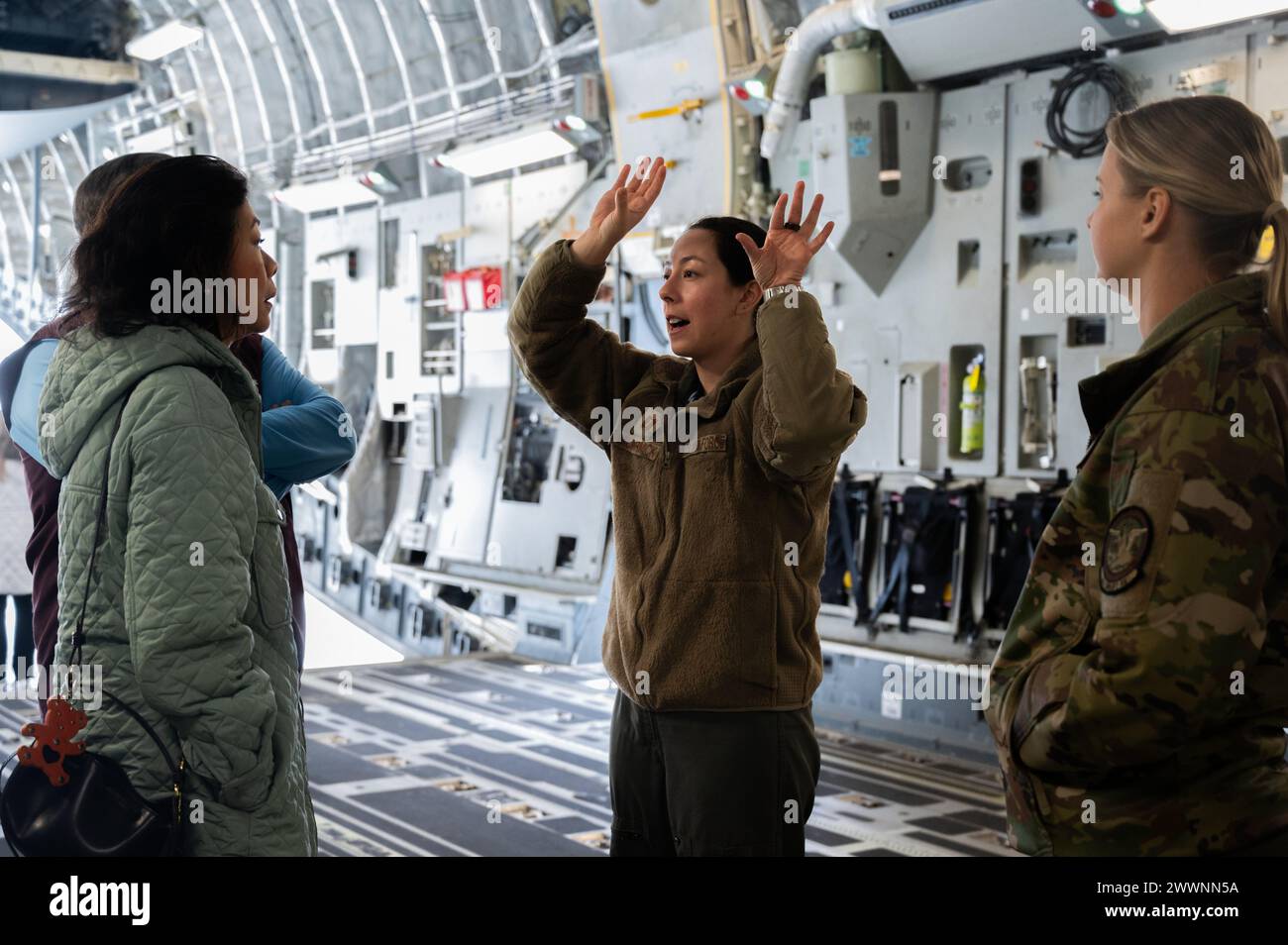 U.S. Air Force Capt. Megan McCormick, middle, a pilot with the 4th ...