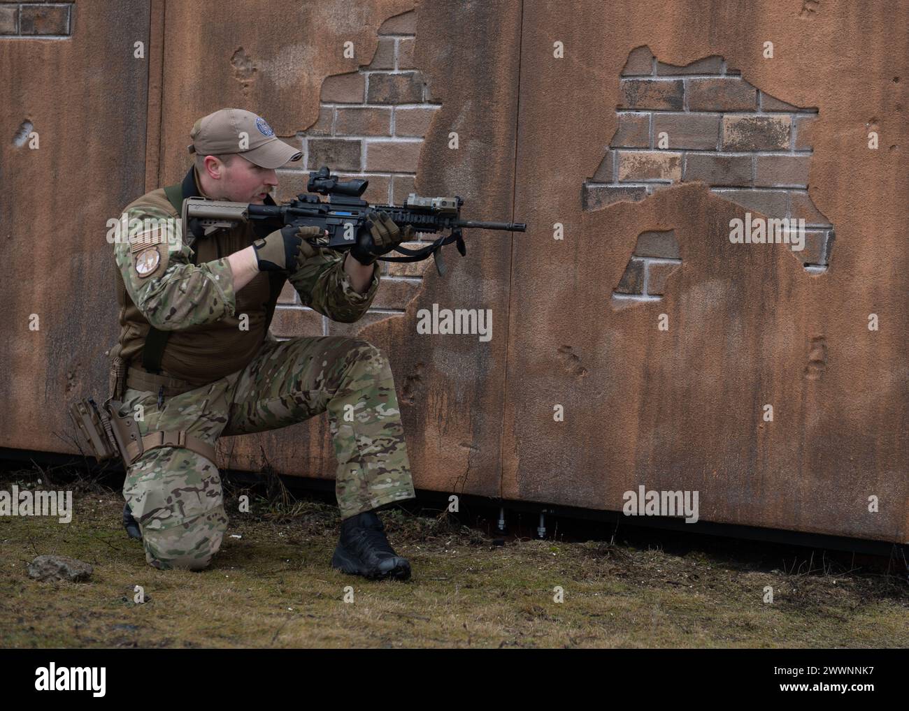 A member of the 116th Air Support Operations Squadron holds their ...