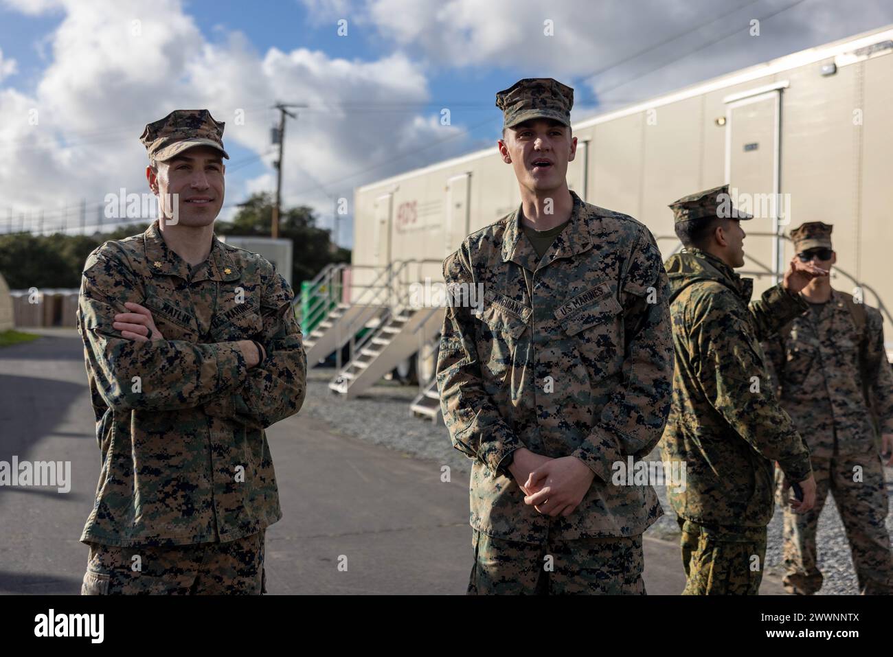 U.S. Marine Corps Maj. John E. Mades, an assistant team leader, with ...