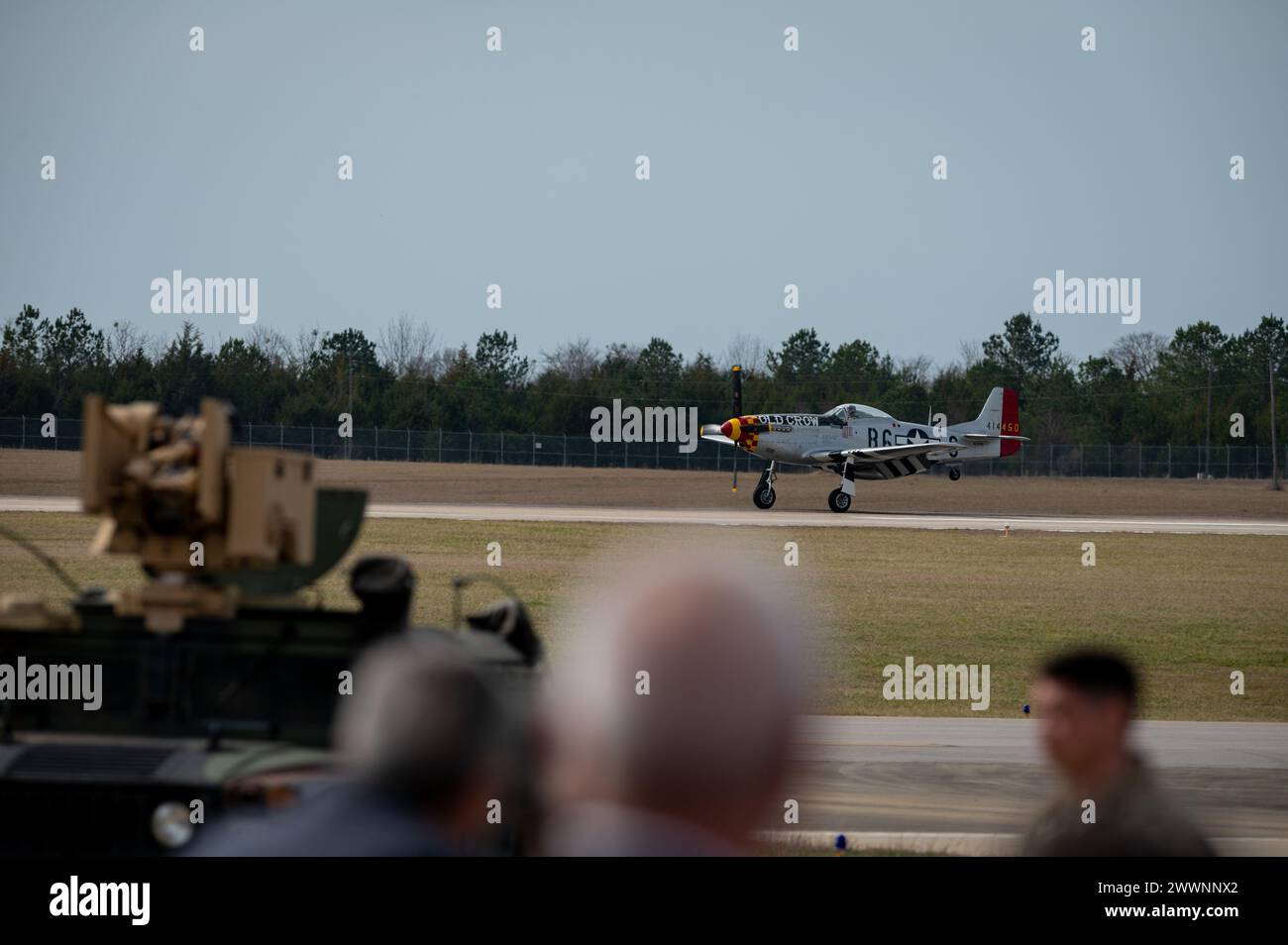 An P-51 Mustang touches down after a flyover that signaled the arrival ...