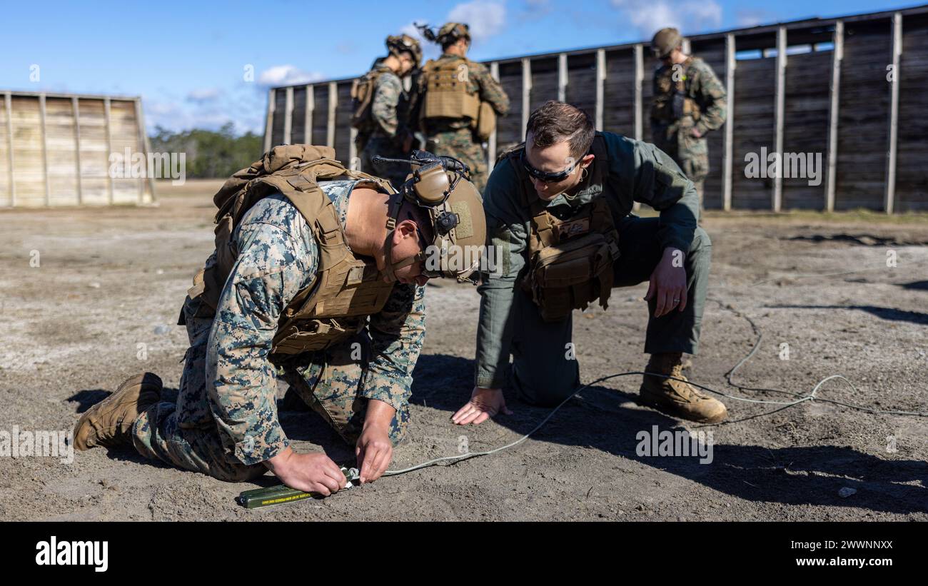 U.S. Marine Corps Sgt. Mitchel Swafford, right, an explosive ordnance ...