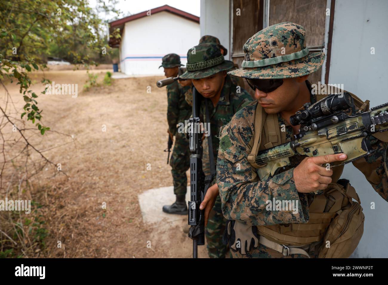 U.S. Marine Corps Lance Cpl. Francisco Izaguirre, front, a mortarman ...