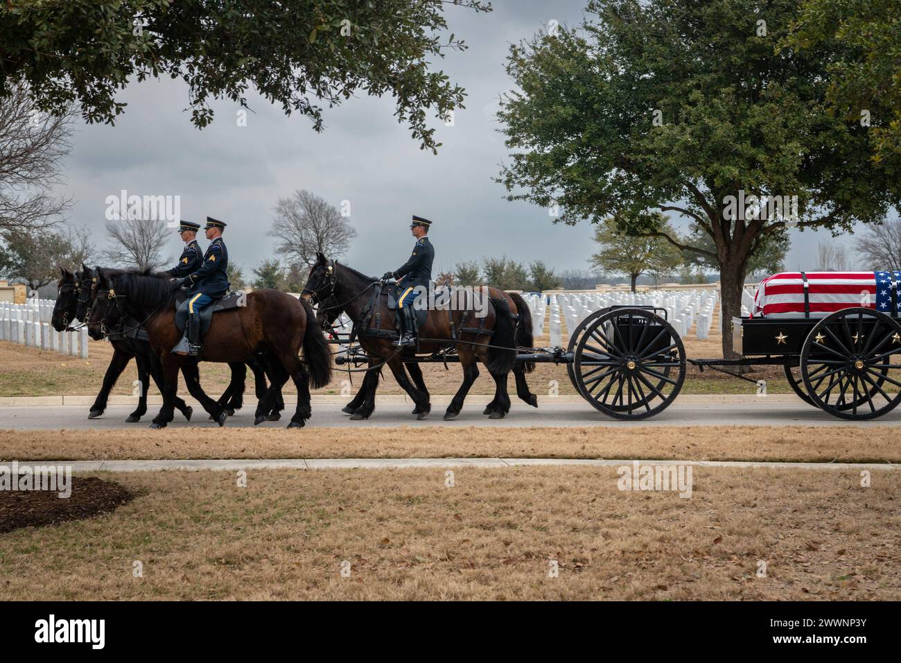 The Fort Sam Houston Caisson Section carry the flag-draped casket of ...