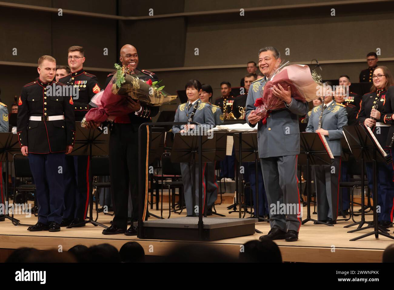 U.S. Marine Corps Chief Warrant Officer 3 DeMarius D. Jackson, left ...