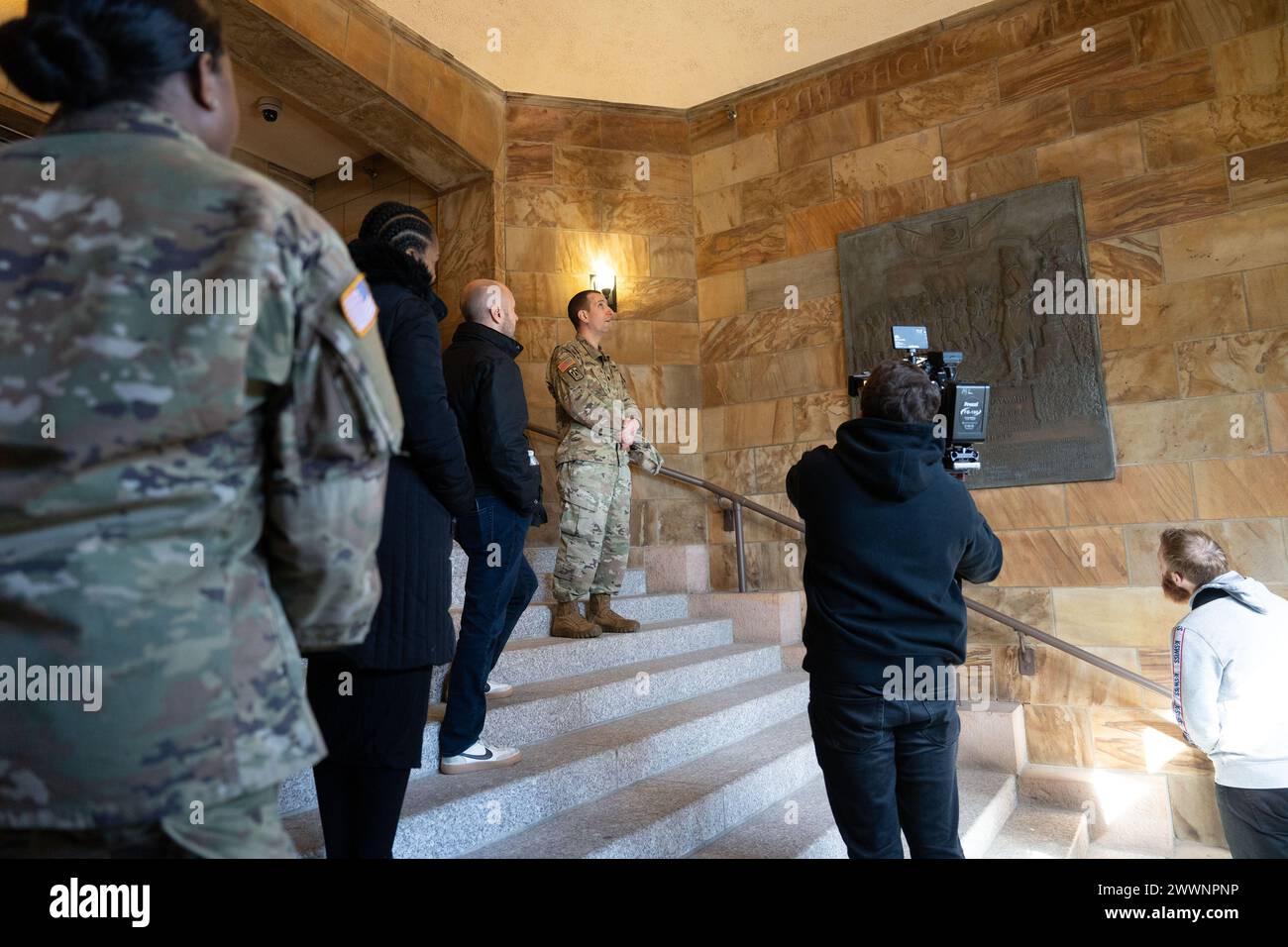 Officers with the 369th Sustainment Brigade meet with members of ...