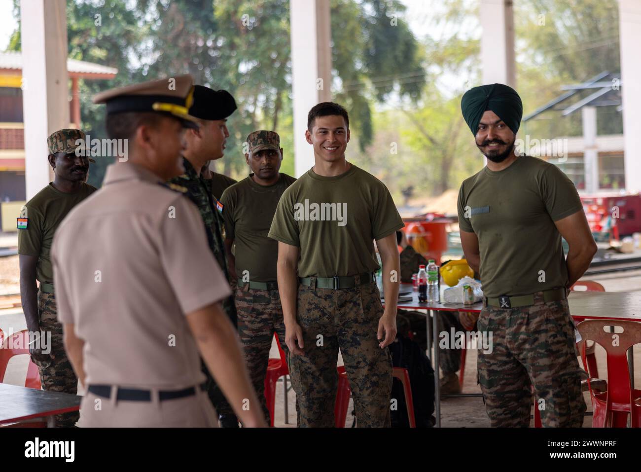 U.S. Marine Corps 1st Lt. Benjamin Schwierking, center, a combat ...
