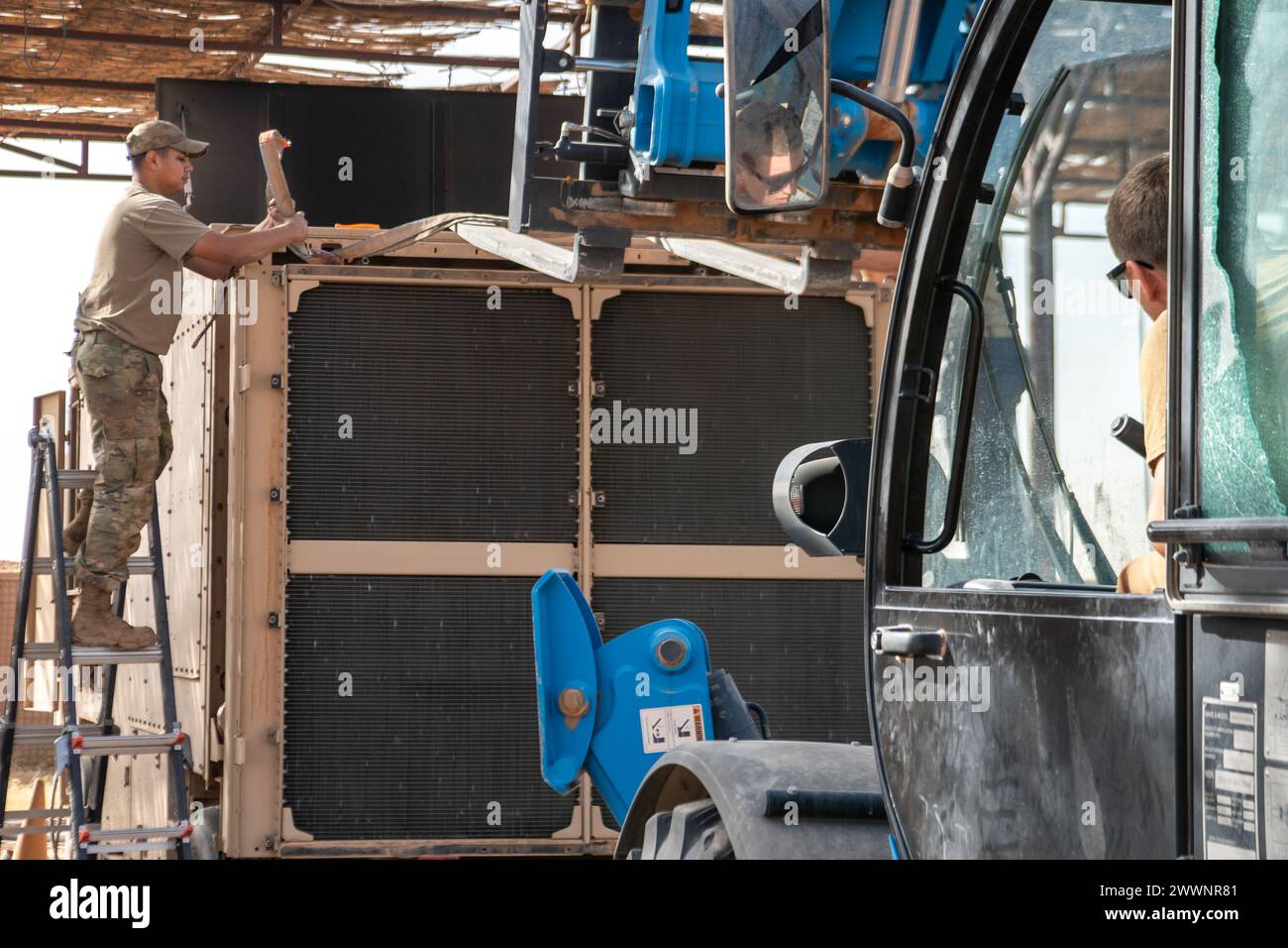U.S. Air Force Senior Airman Samuel Sandoval Leija, left, 724th ...
