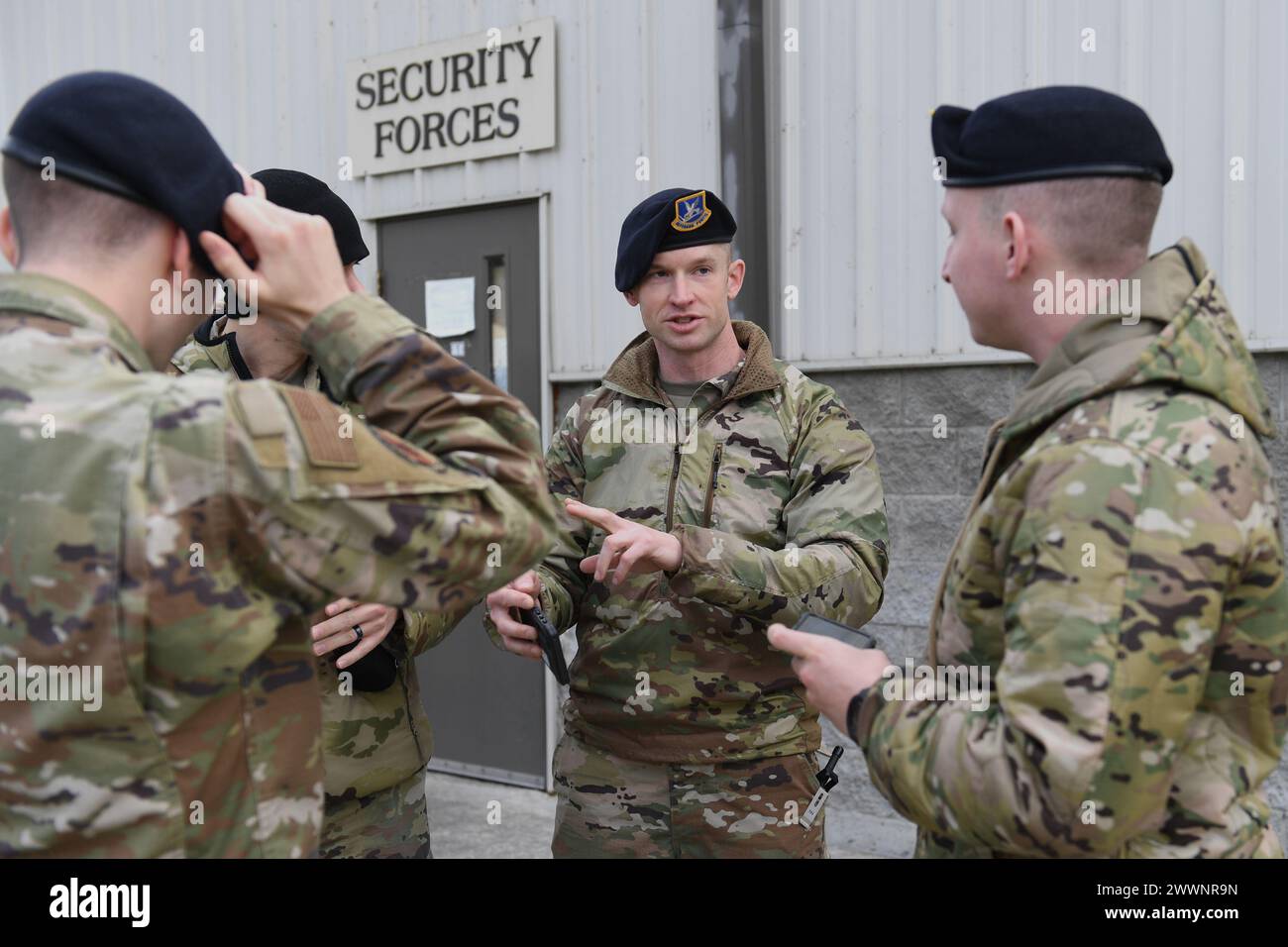 Tech. Sgt. Charles Oakley (center), 194th Security Forces Squadron team ...