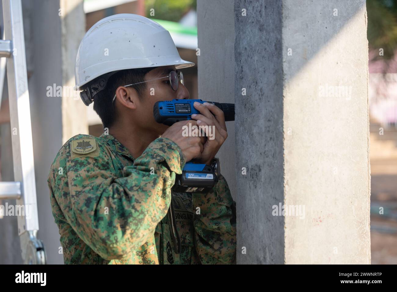A member of 30th Battalion, Singapore Combat Engineers observes ...
