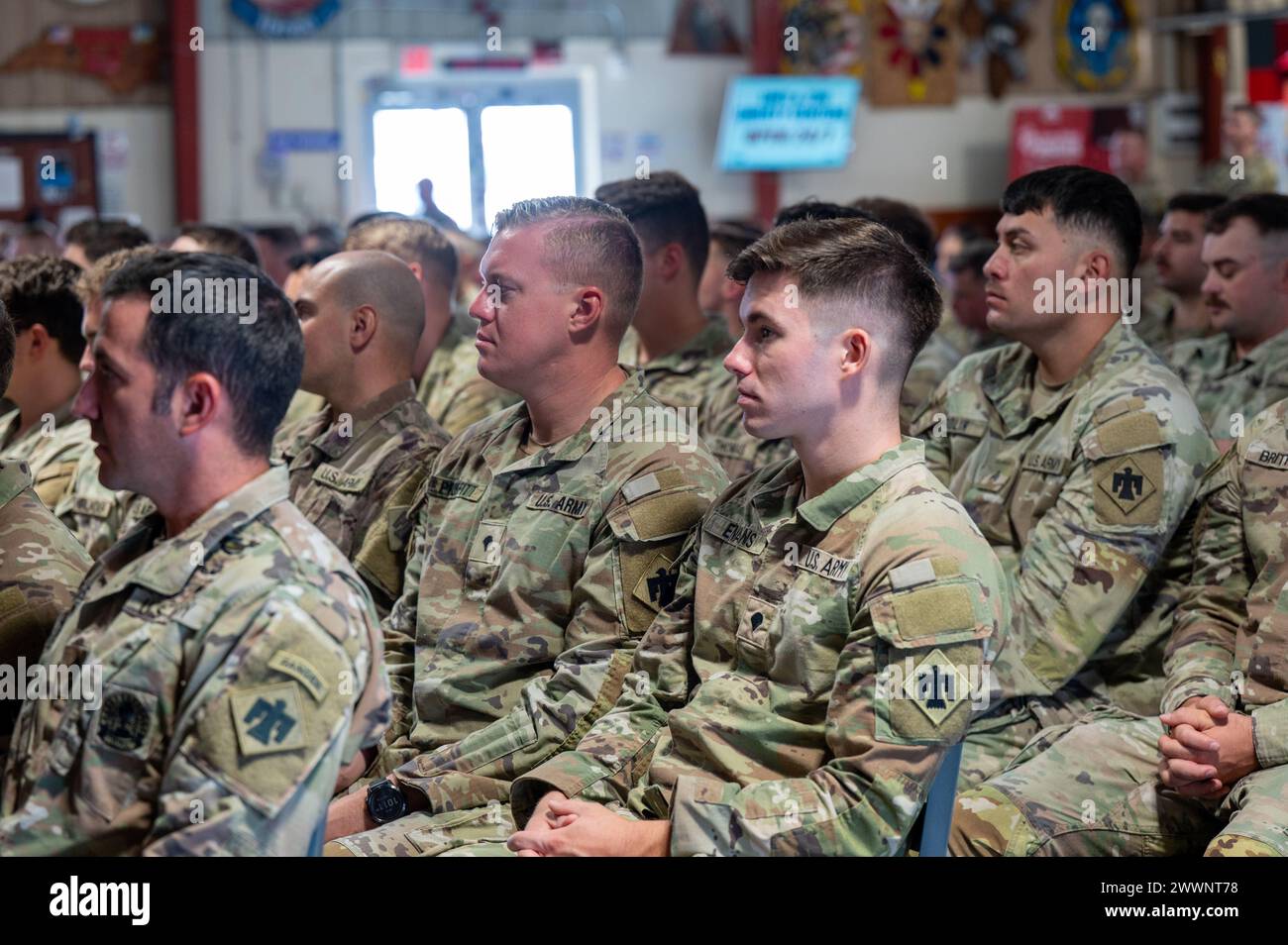 Soldiers from Task Force Tomahawk sit in the crowd during their ...