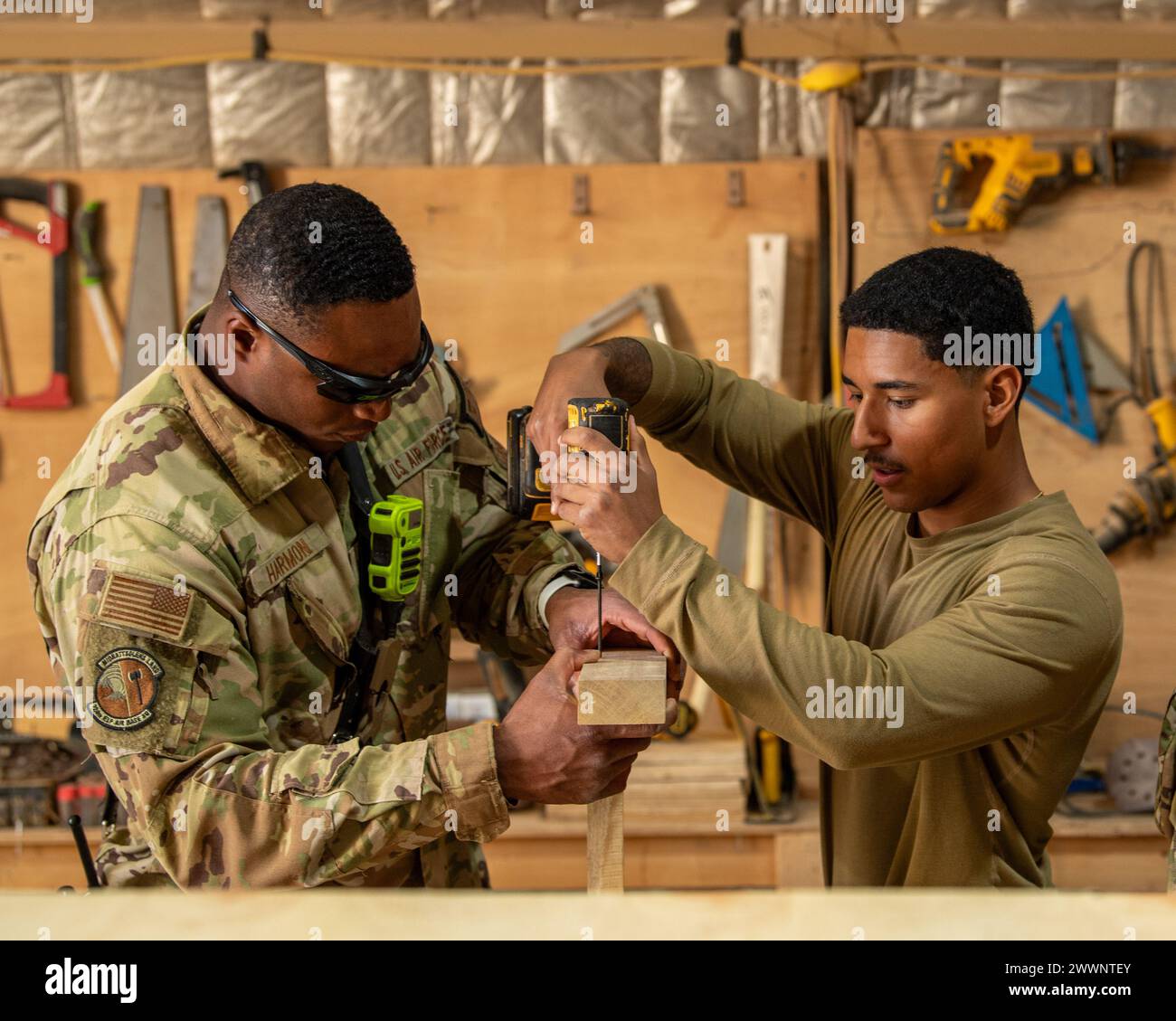 U.S. Air Force Staff Sgt. Antonio Harmon, left, and Airman 1st Class ...