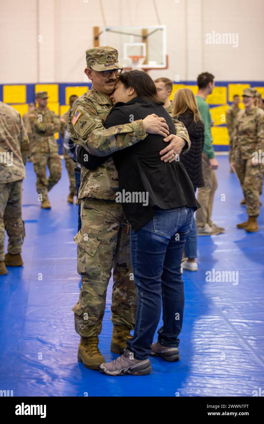 120 Soldiers return home from deployment Feb. 9 as they are embraced by ...